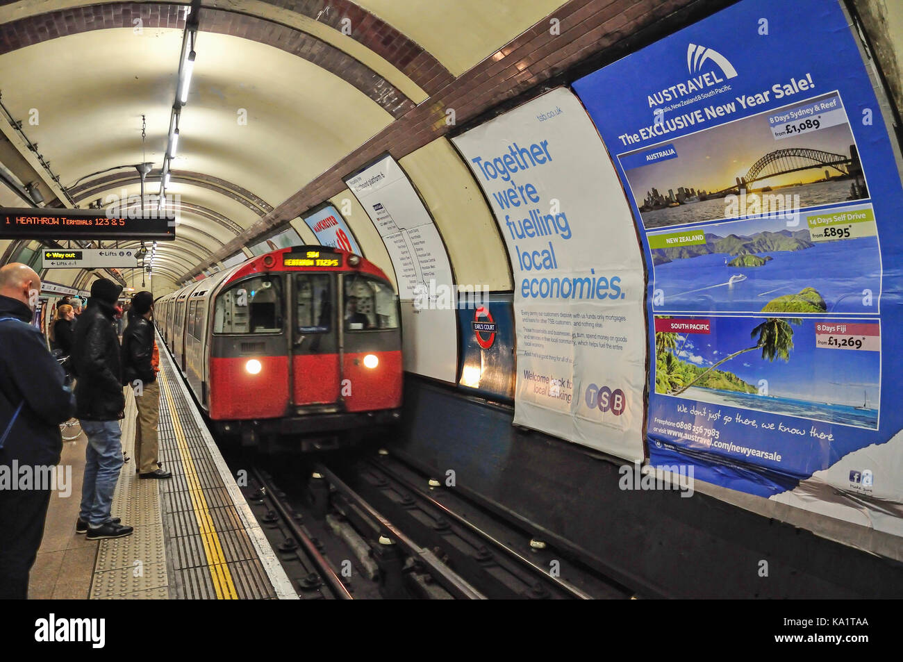 London Underground train approaching platform at Earl's Court Station ...