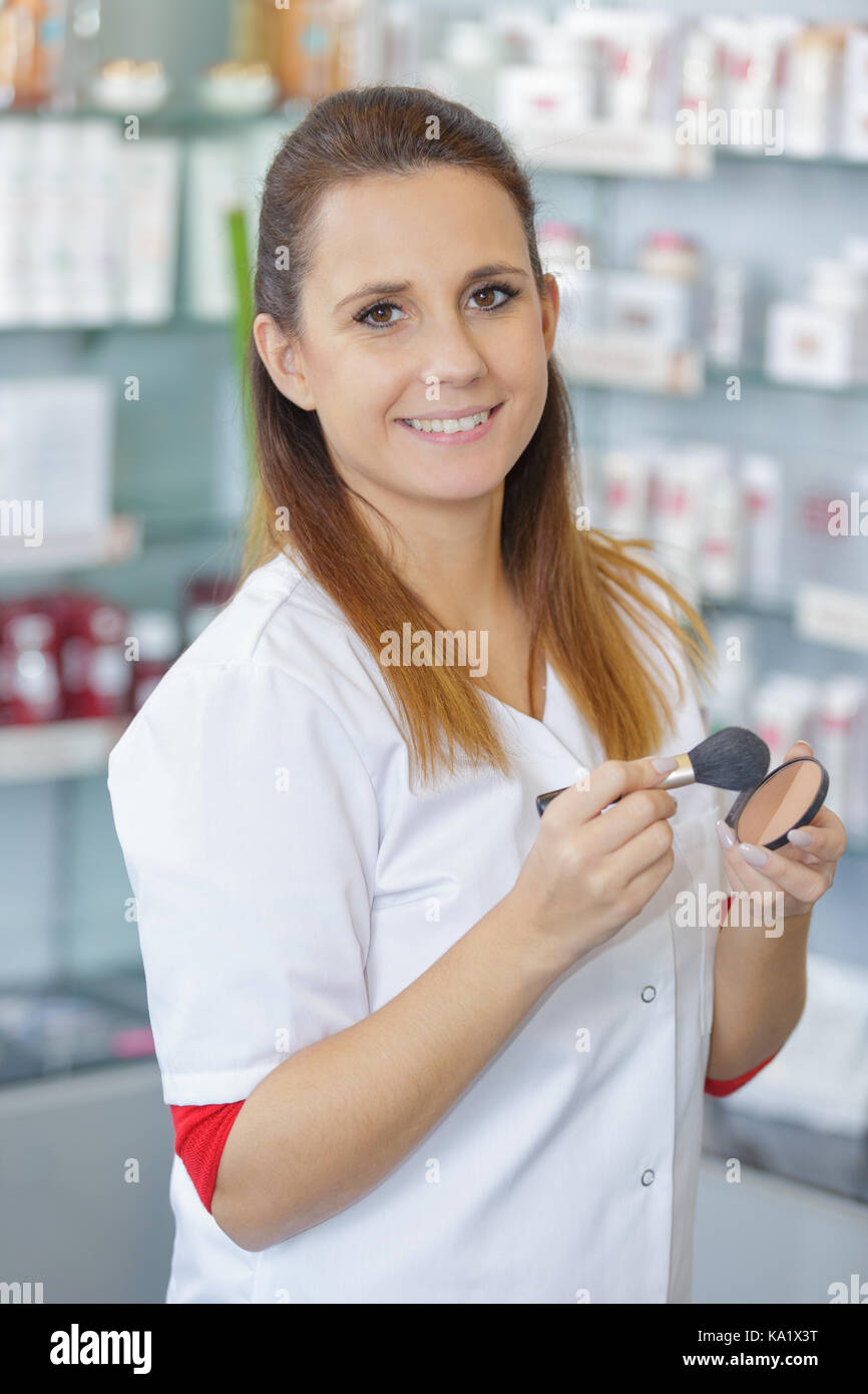 beautiful pharmacist choosing the product in drugstore Stock Photo - Alamy