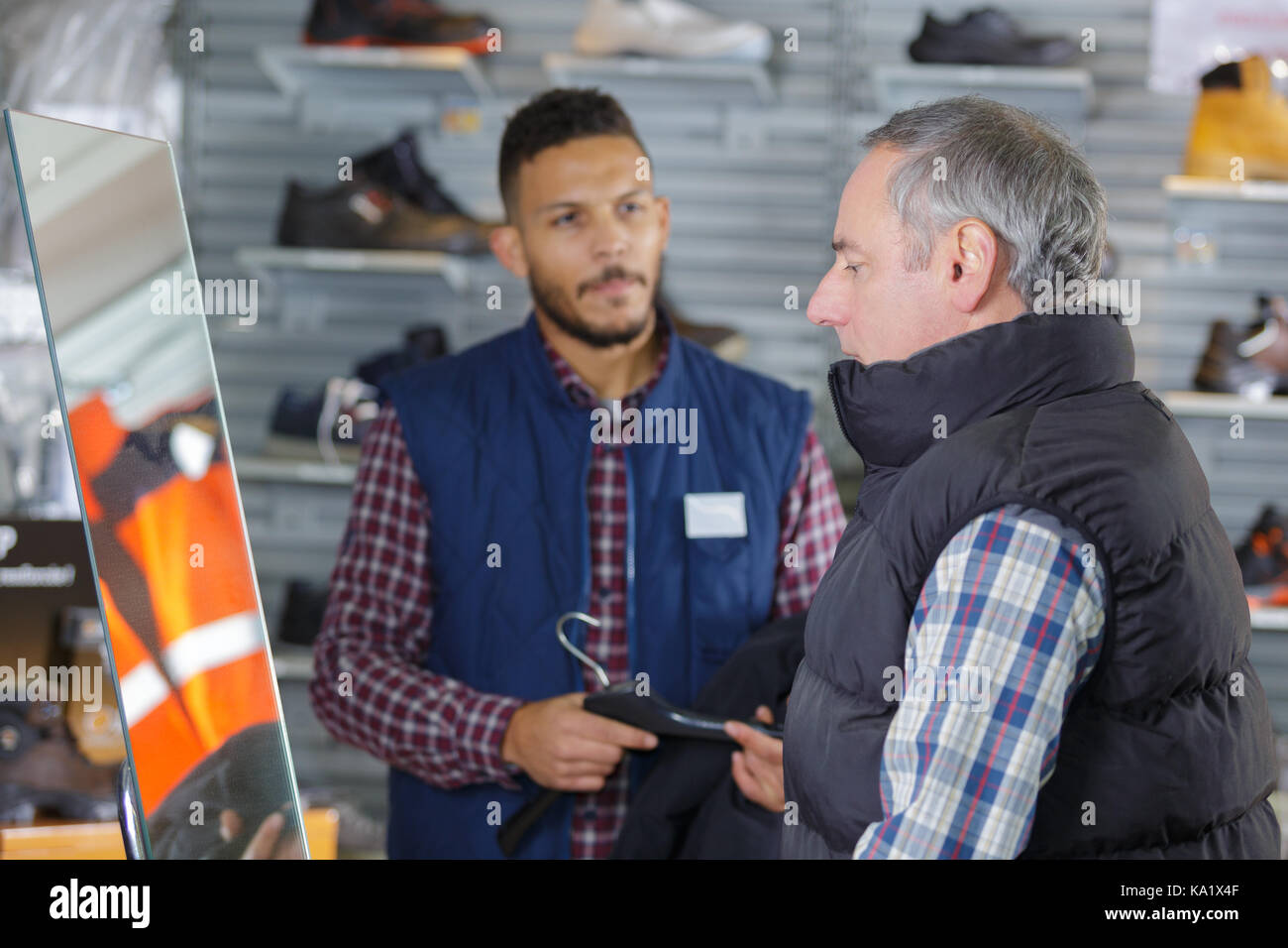 shopper fitting the product Stock Photo - Alamy