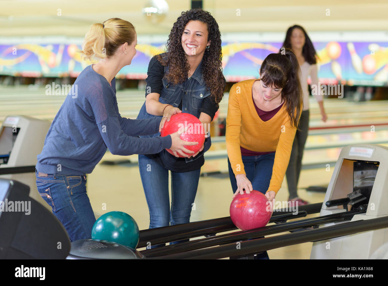 young group of friends in bowling alley Stock Photo - Alamy