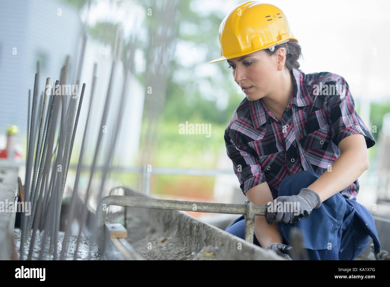 woman working on metal structure Stock Photo - Alamy