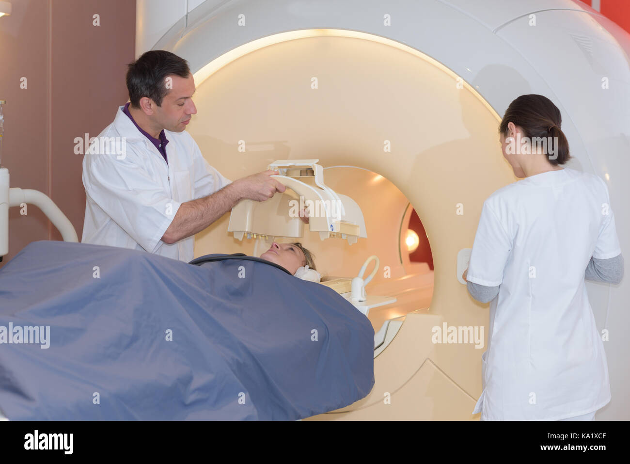 Technician Preparing Patient Mri Examination High Resolution Stock ...