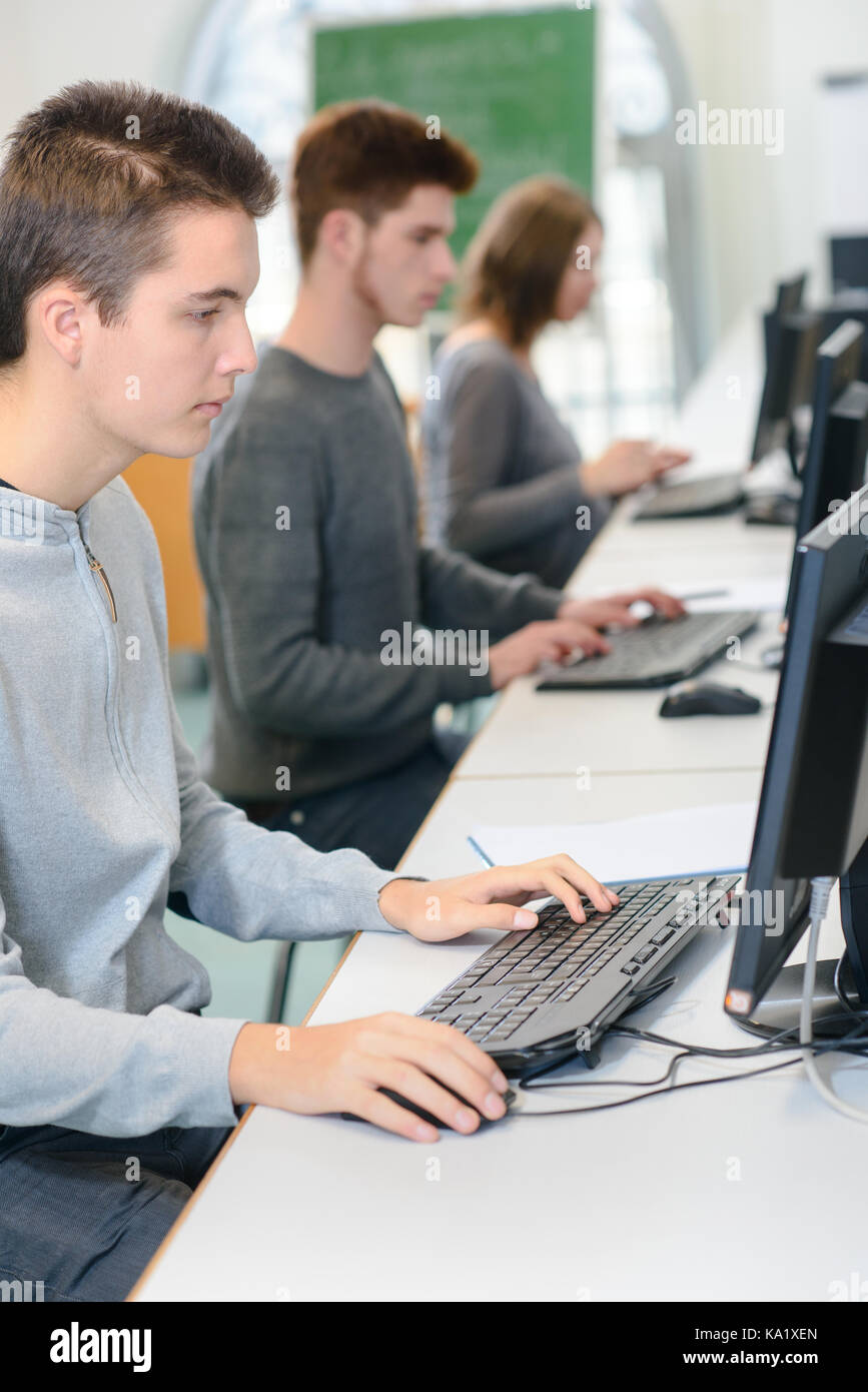 group of college students attending a computer class Stock Photo - Alamy