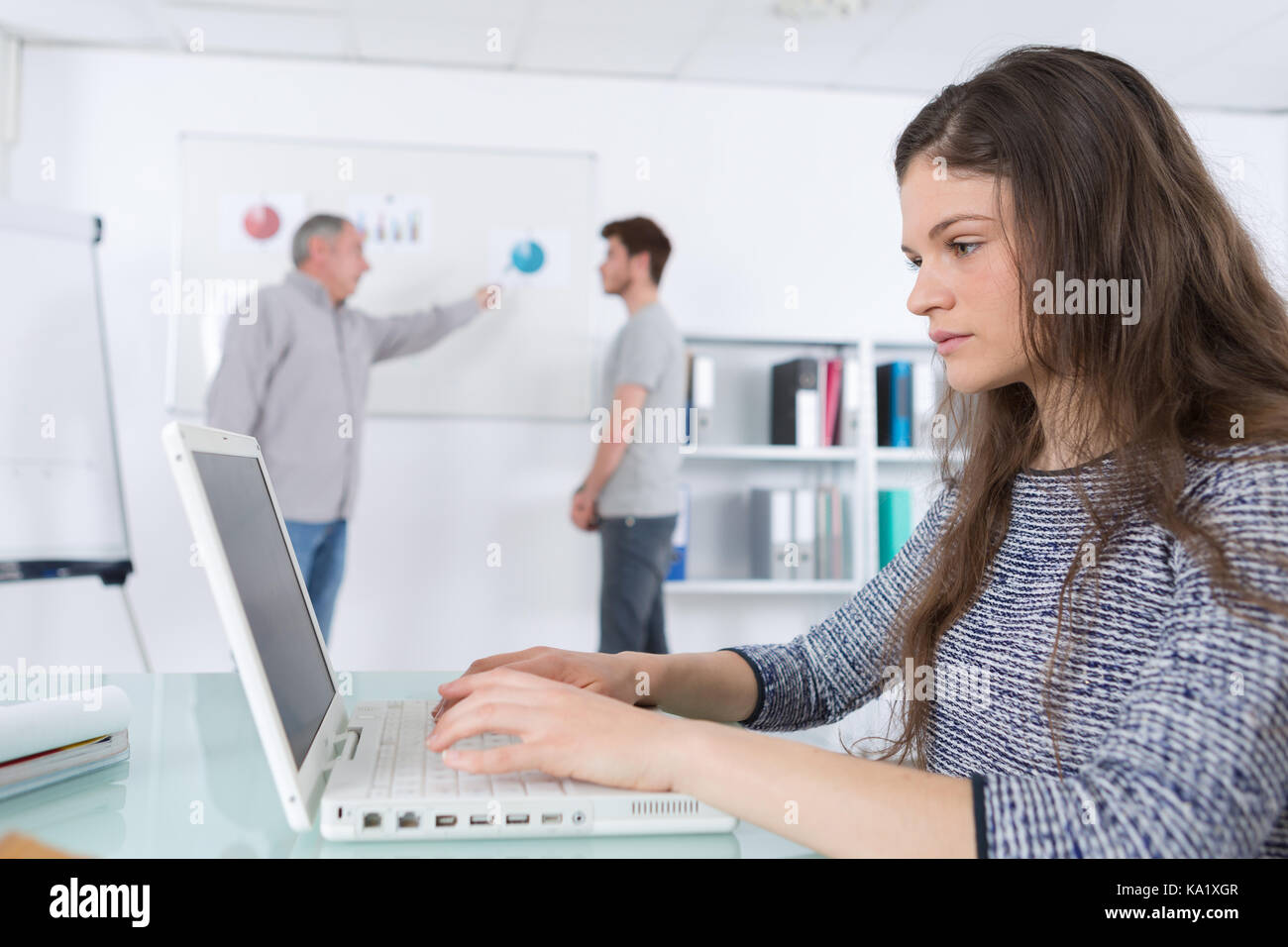 student taking notes with laptop in class in university Stock Photo - Alamy