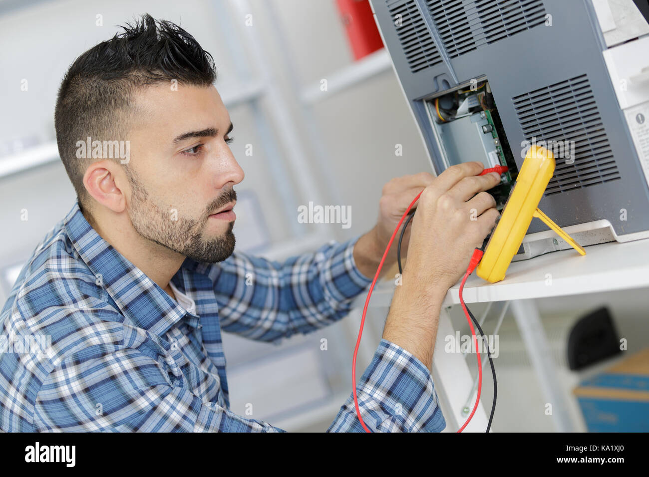 Engineer using measuring device hi-res stock photography and images - Alamy