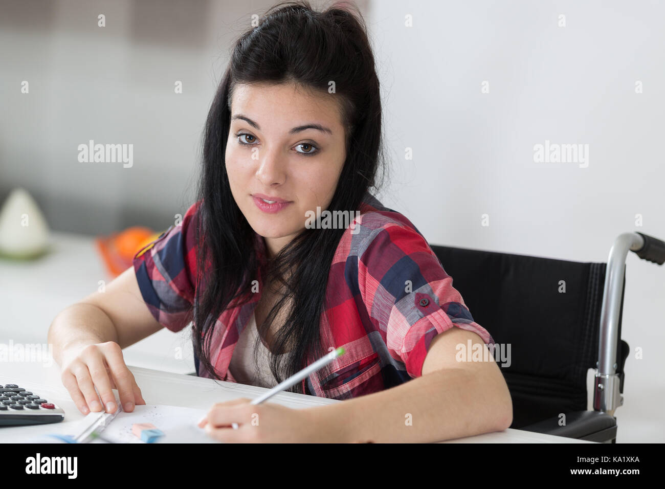 smiling disabled student in library at the university Stock Photo - Alamy