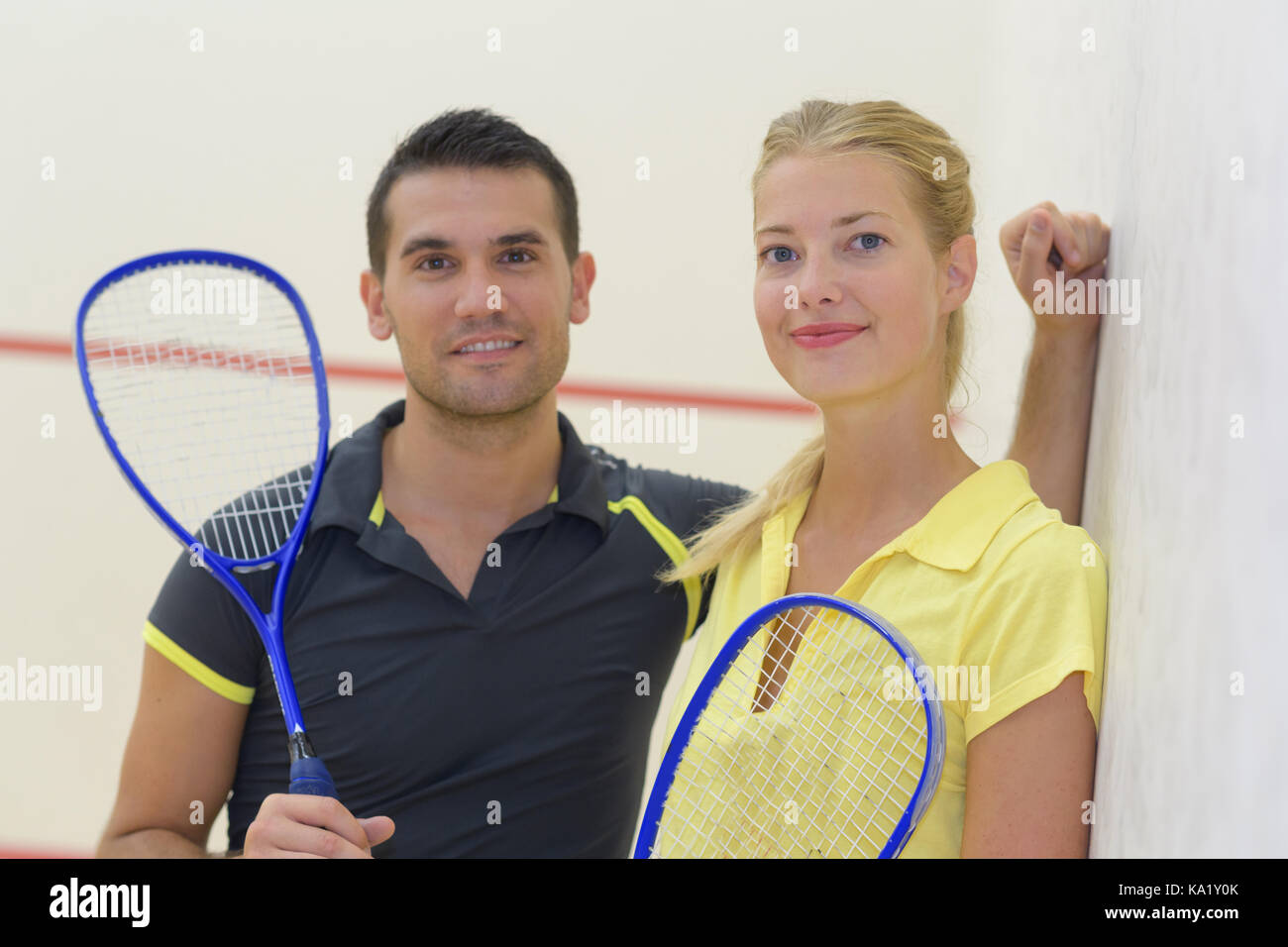 young cheerful couple after playing badminton Stock Photo - Alamy
