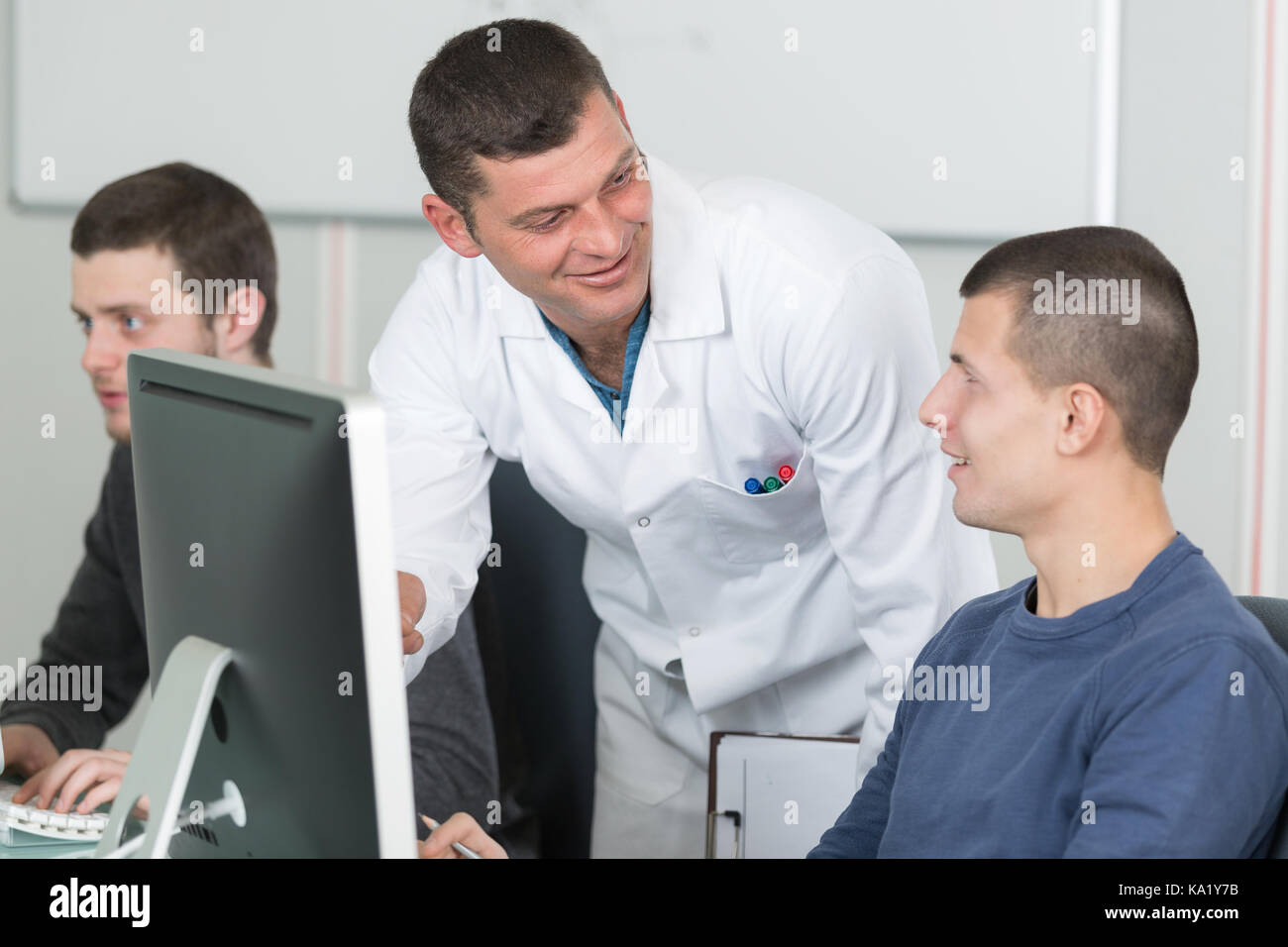 group of students with teacher in computer lab classrom Stock Photo - Alamy