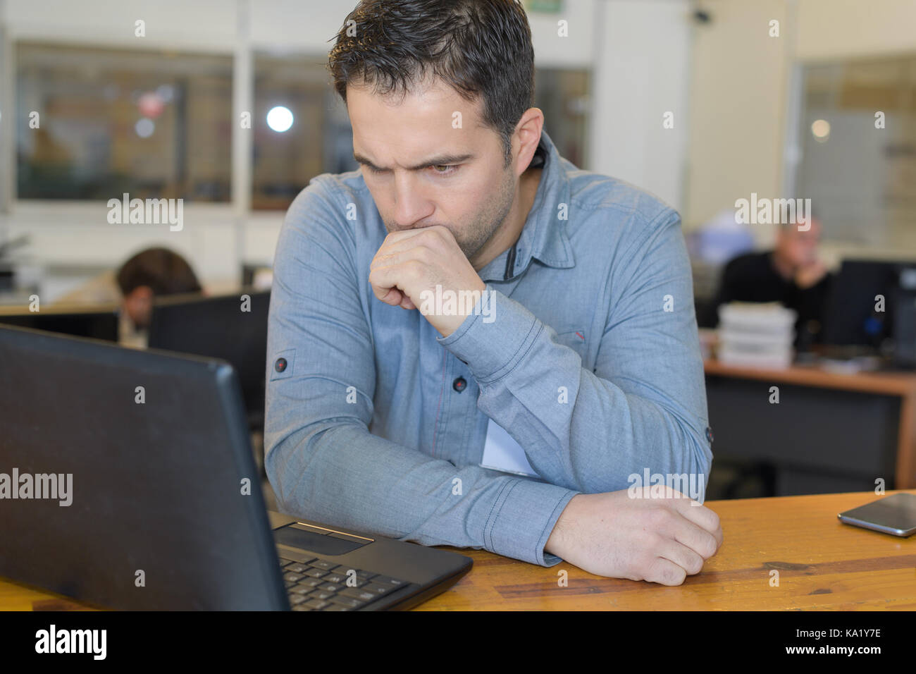editor reading an article Stock Photo - Alamy