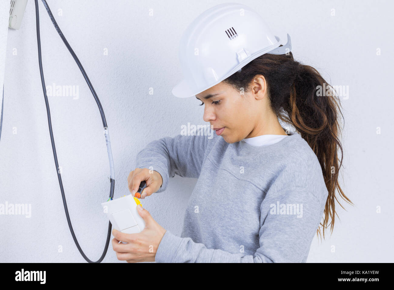 female plumber apprentice Stock Photo - Alamy
