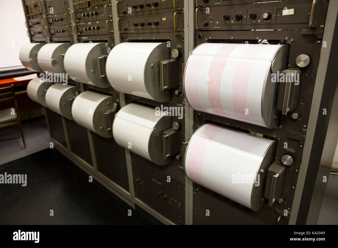 Seismograph records an earthquake on the sheet of measuring paper ...