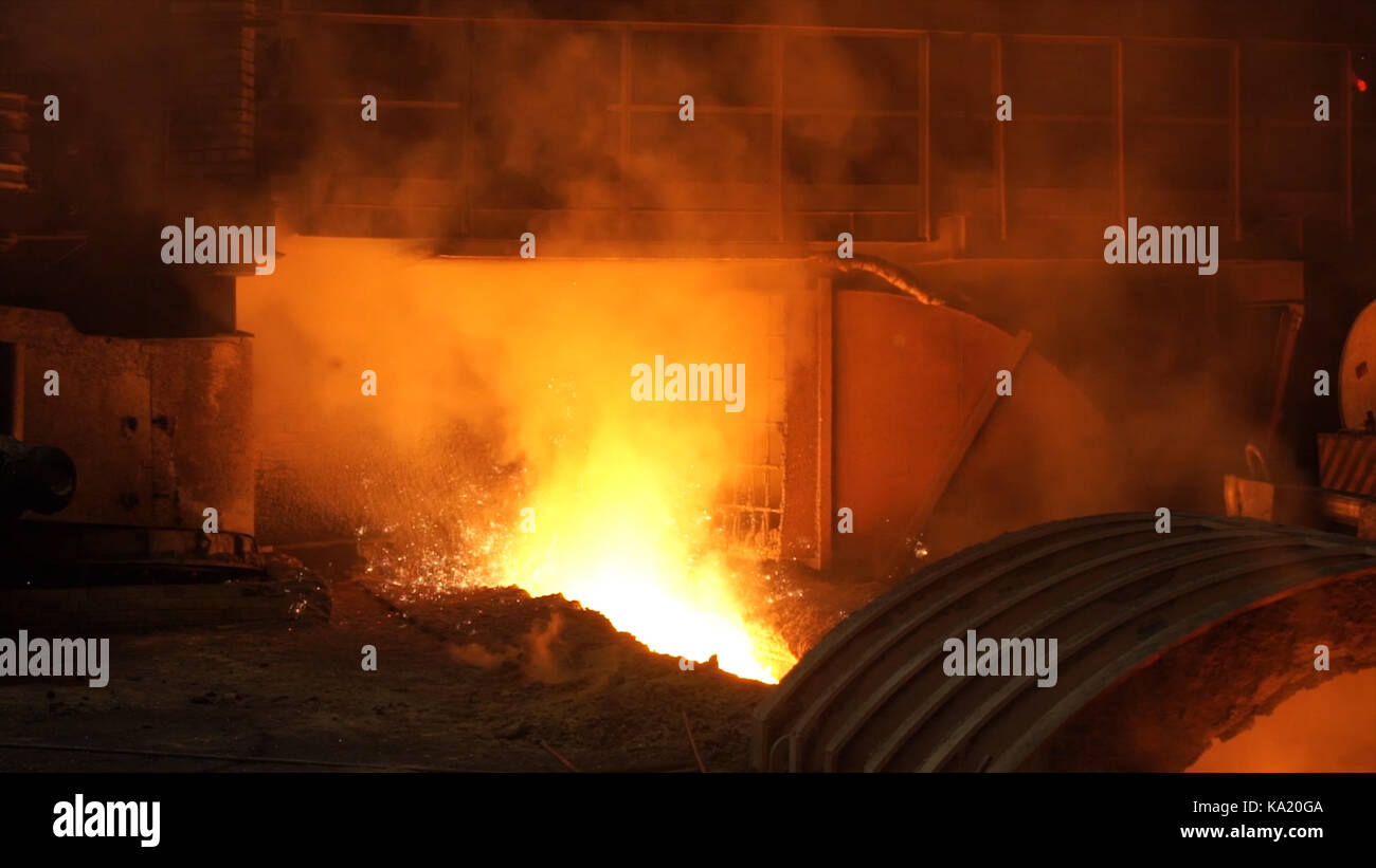 Liquid metal from blast furnace. Liquid iron from ladle in the ...