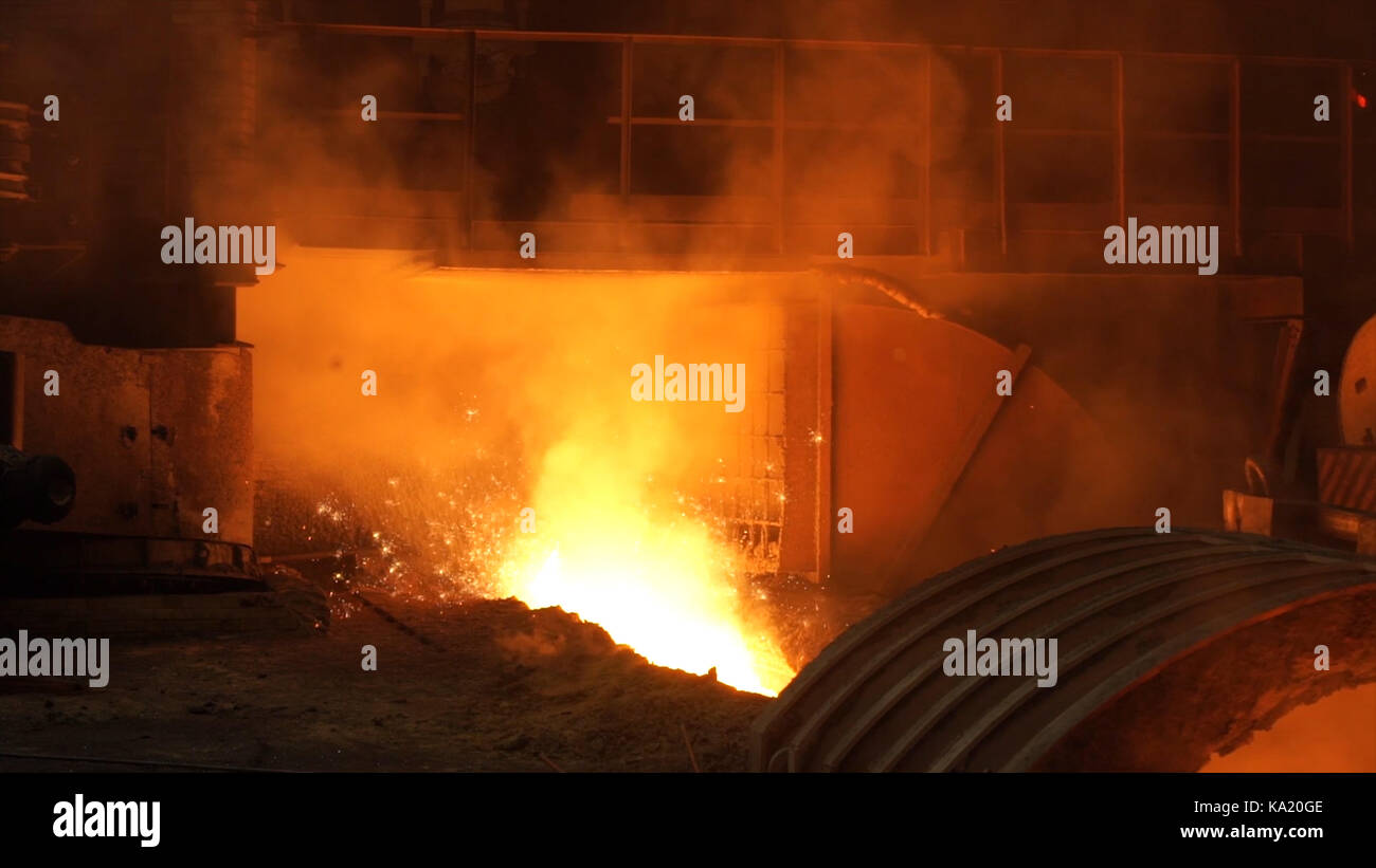 Liquid metal from blast furnace. Liquid iron from ladle in the ...