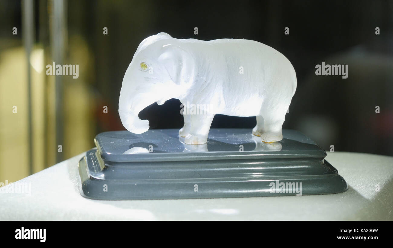 White figurine of an elephant. Statue of the white elephant Stock Photo ...