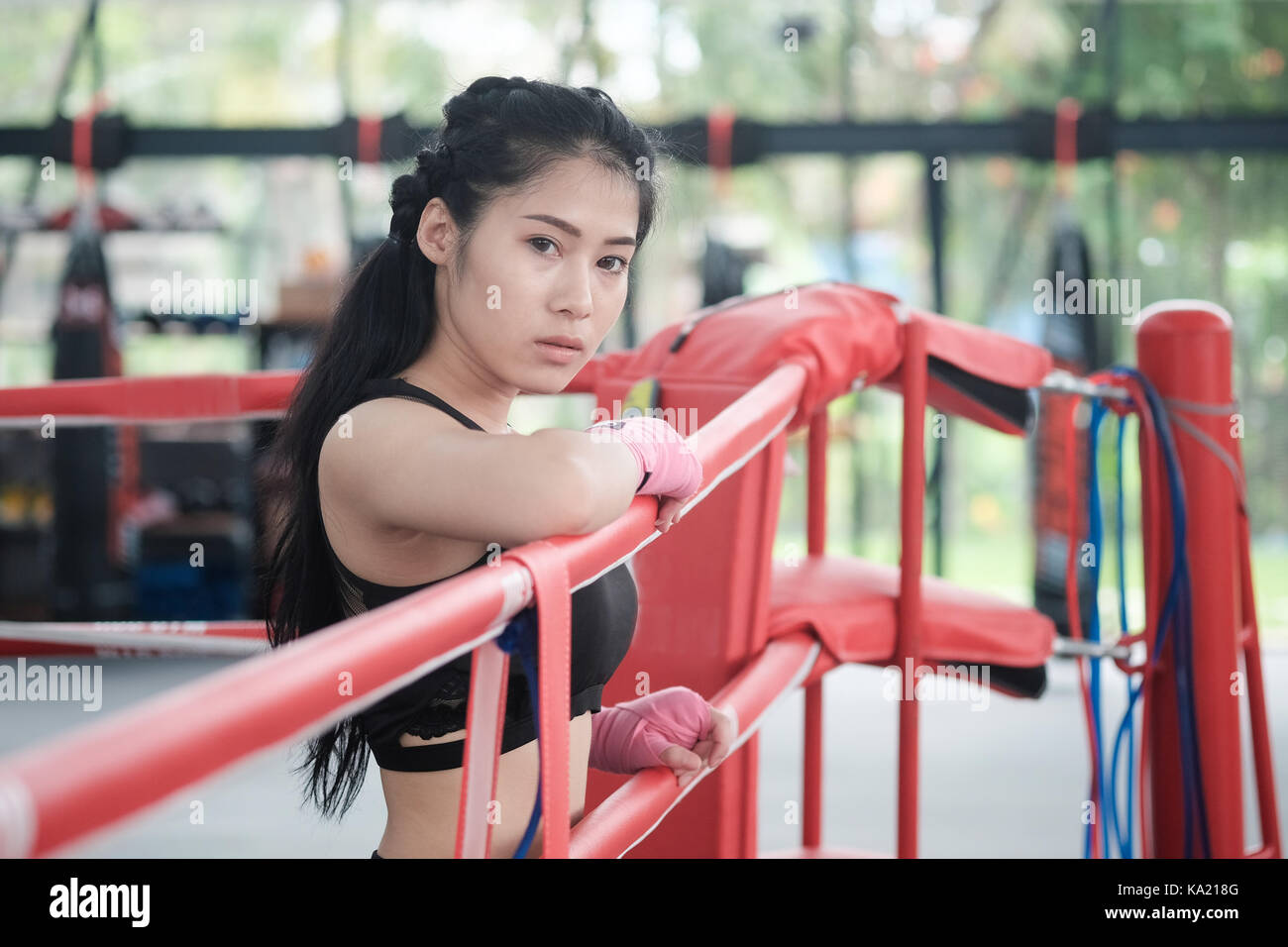 Portrait asian woman on ringside boxing gym Stock Photo - Alamy