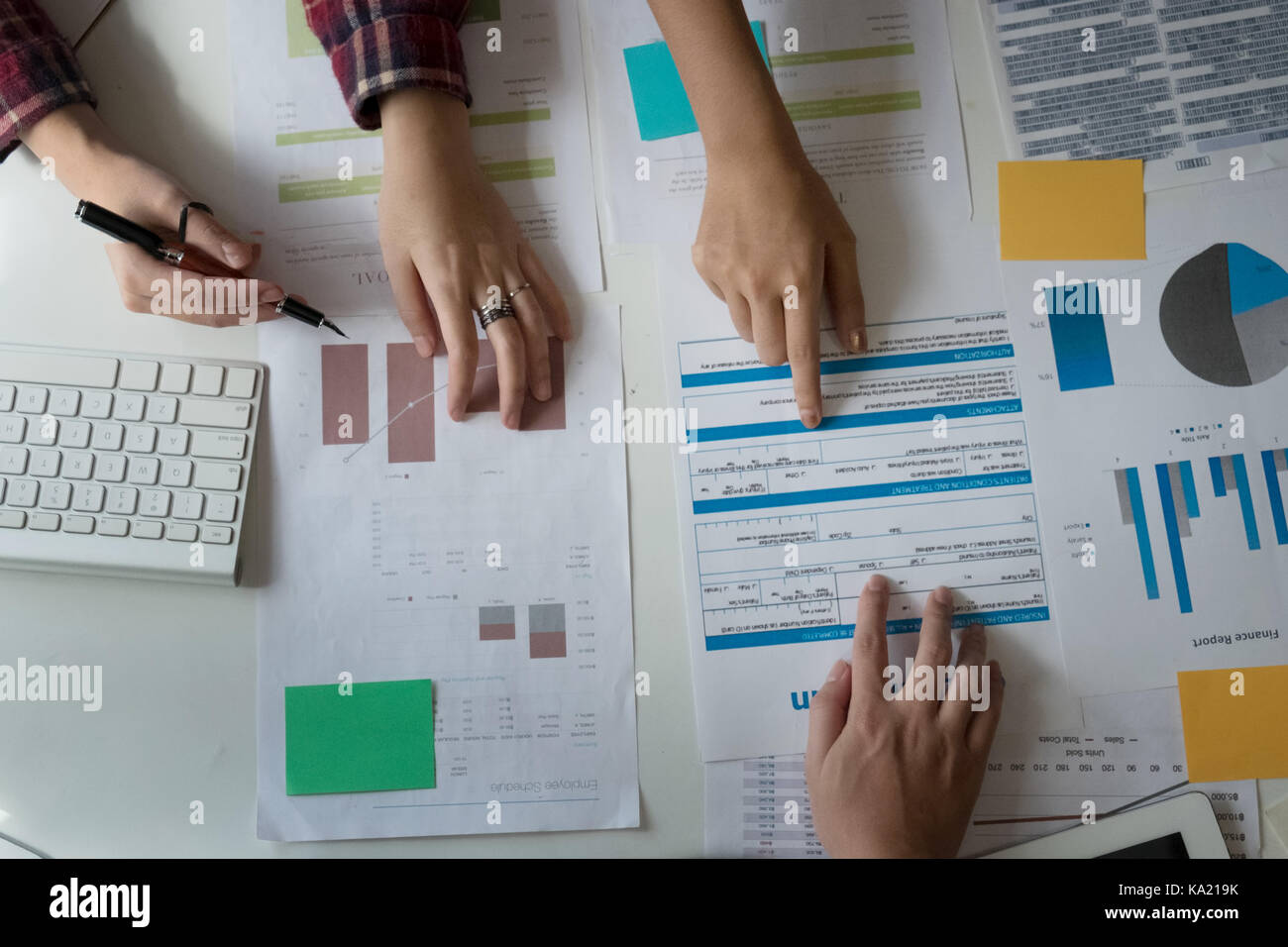 financial team meeting with paper report, top view on finance desk ...