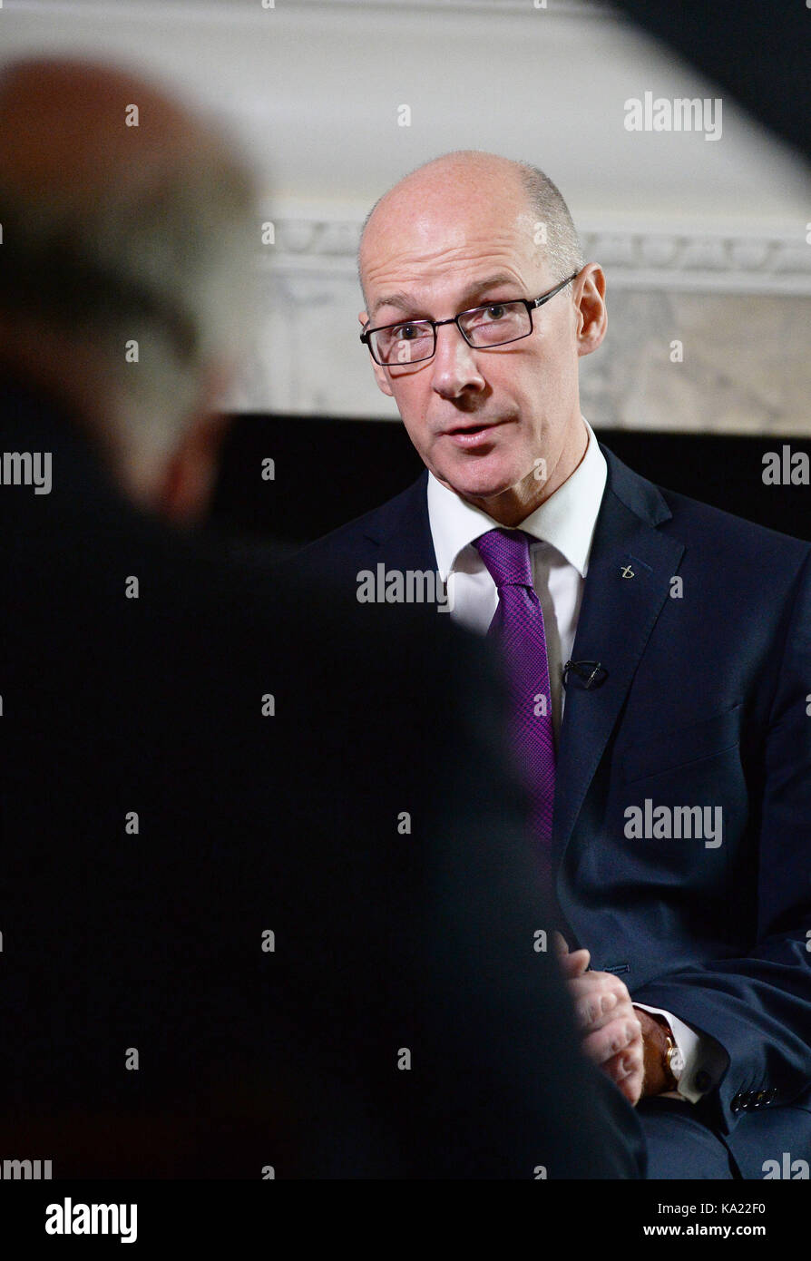 Scottish Deputy First Minister John Sweeney conducts a TV interview ...