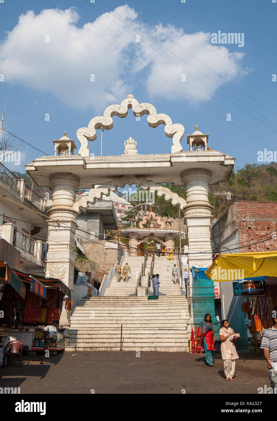 Pilgrims at the great white gates in the Jwalamukhi Devi Temple ...