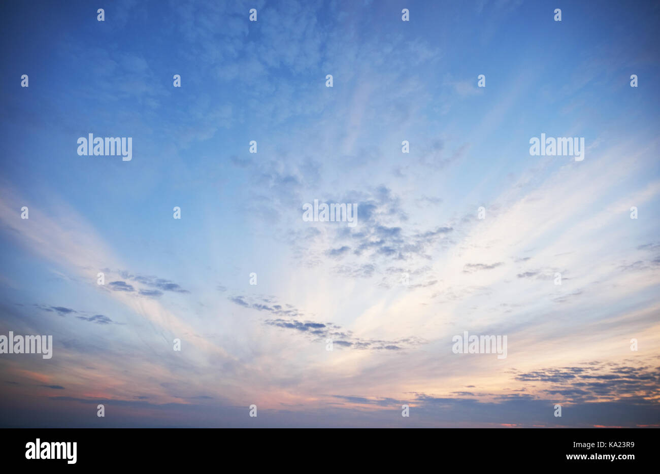 Golden light shining through the clouds in a colorful evening Stock ...