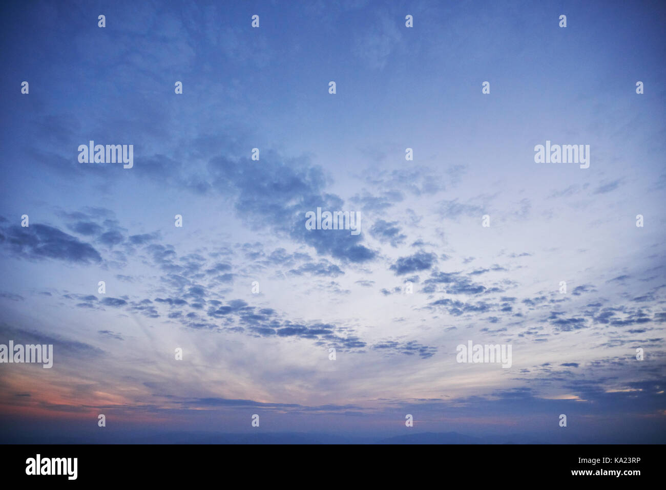 Golden light shining through the clouds in a colorful evening Stock ...
