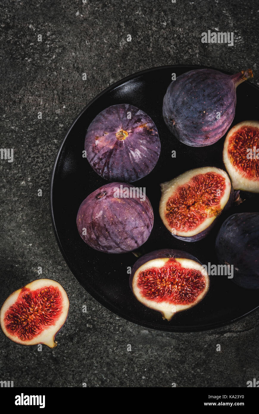 Raw fresh figs on dark stone background, copy space top view Stock ...