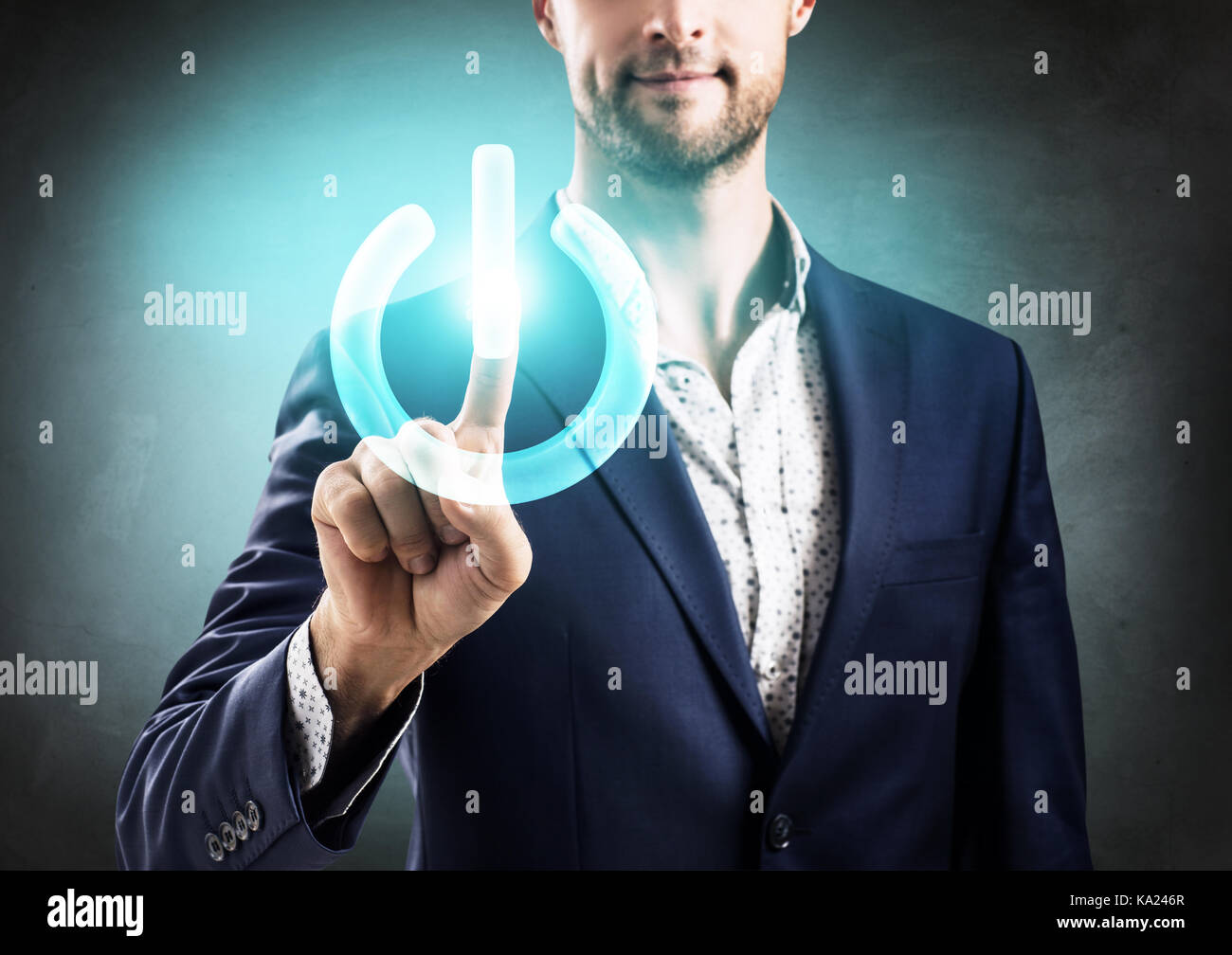 Businessman pressing power futuristic button Stock Photo - Alamy
