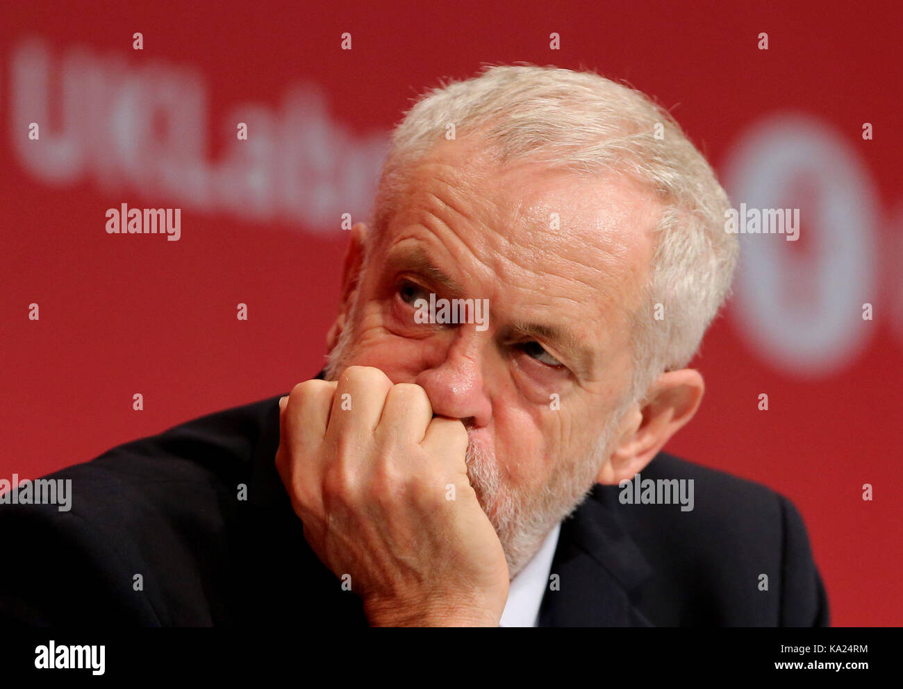 Labour leader Jeremy Corbyn listens to speeches at the Labour Party ...