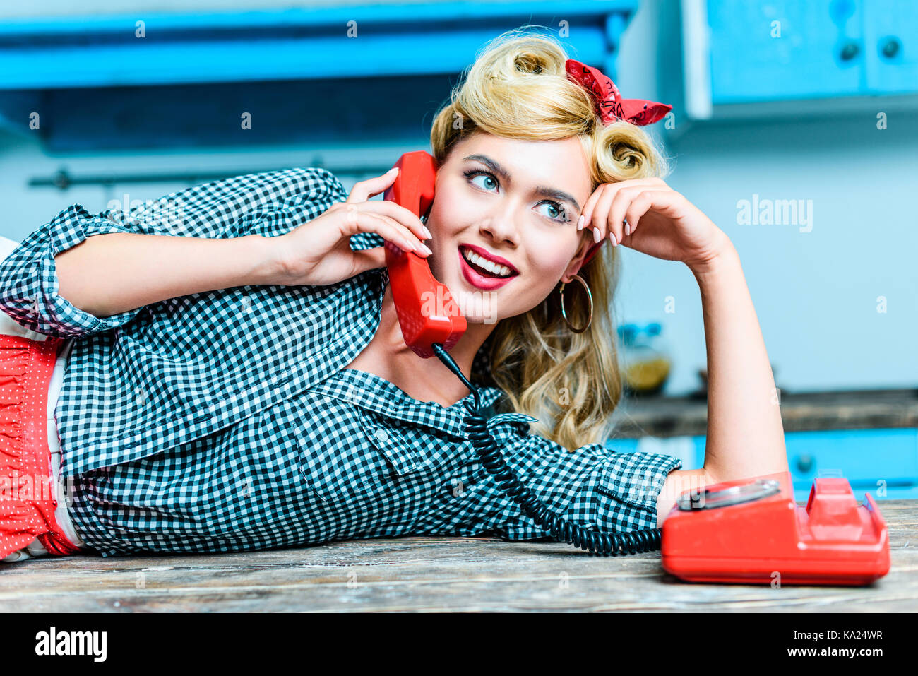 pin up girl talking on telephone Stock Photo - Alamy