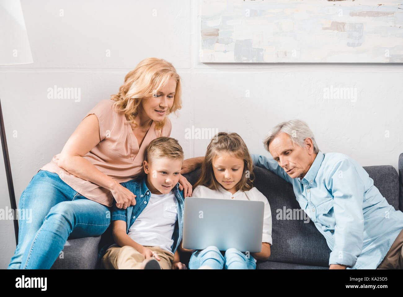Kids using computer hi-res stock photography and images - Alamy