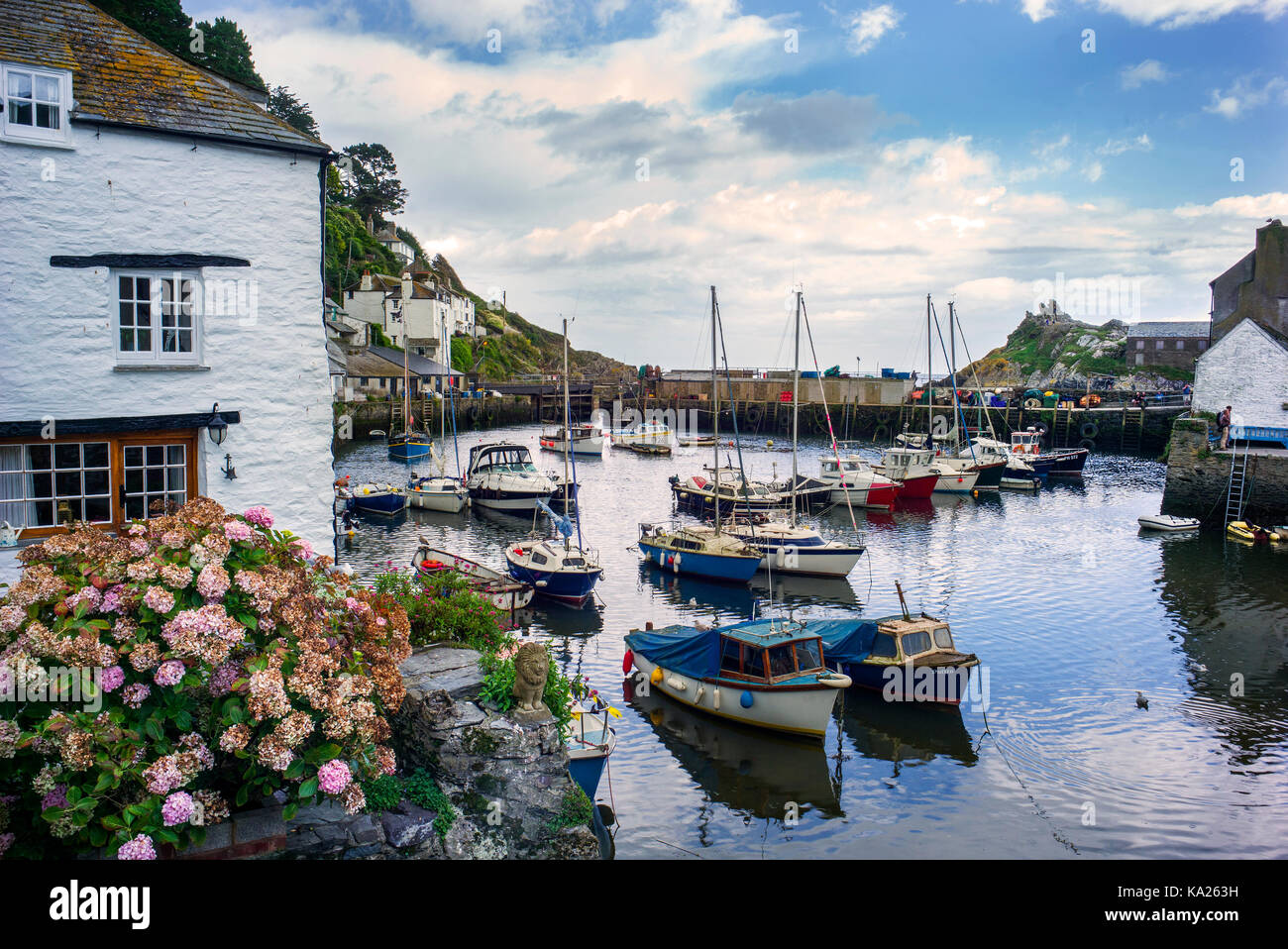 boats moored in Polperro harbour south coast of Cornwall UK Stock Photo ...