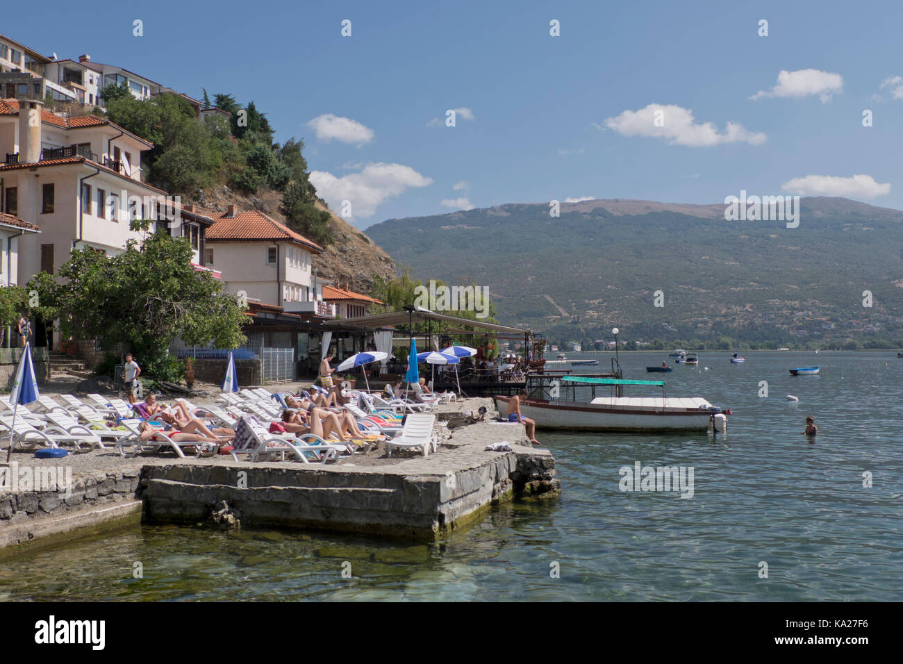 Tourists on beach by lake Ohrid,Macedonia,Eastern Europe Stock Photo ...
