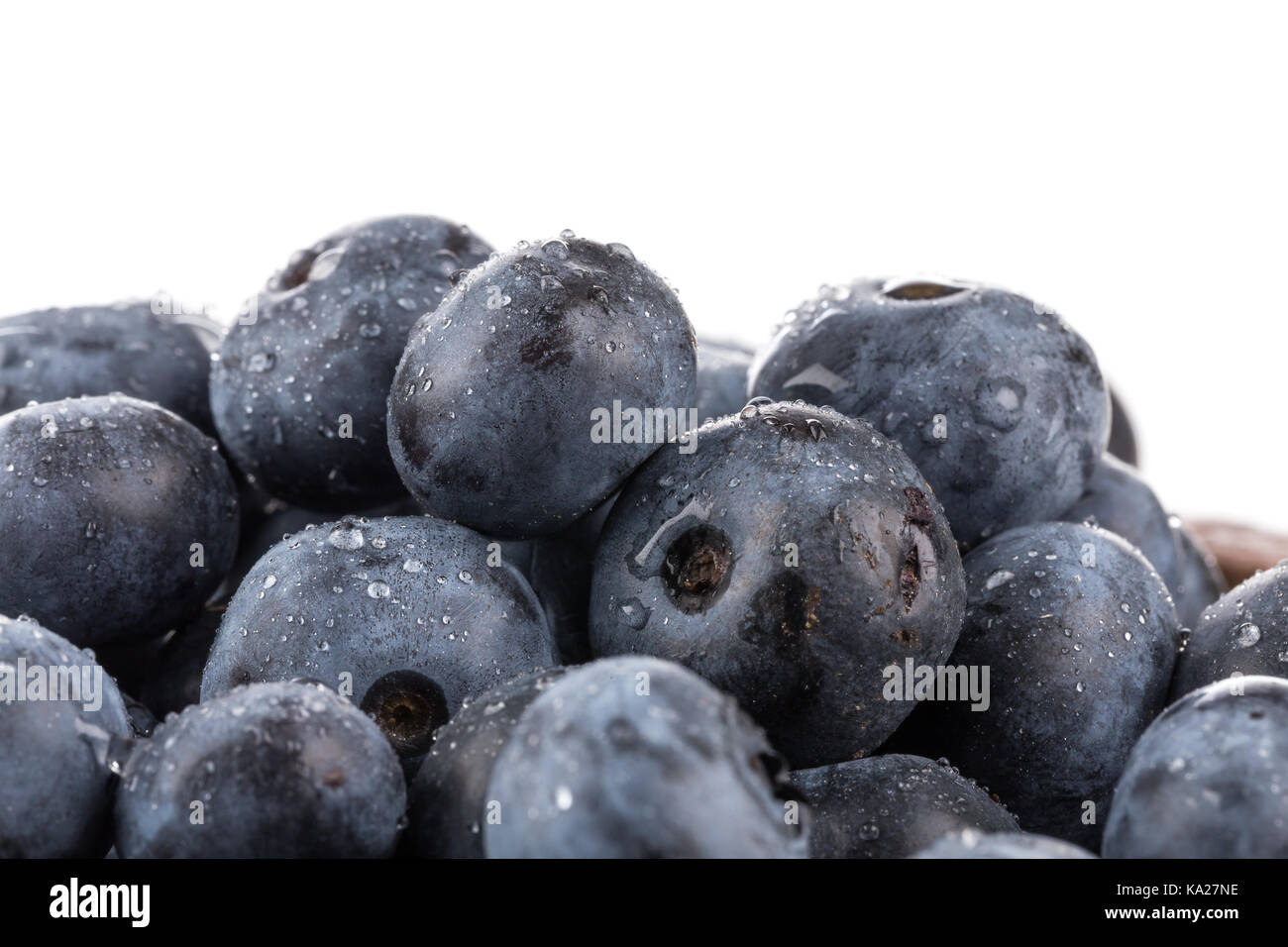 Fresh blueberries with water drops isolated on white background - close ...