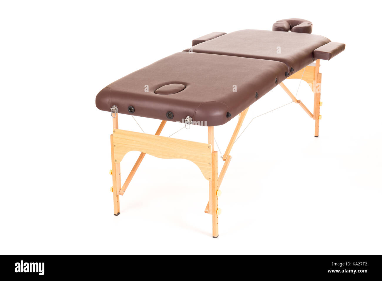 Massage Table from leather and wood isolated on a white background ...