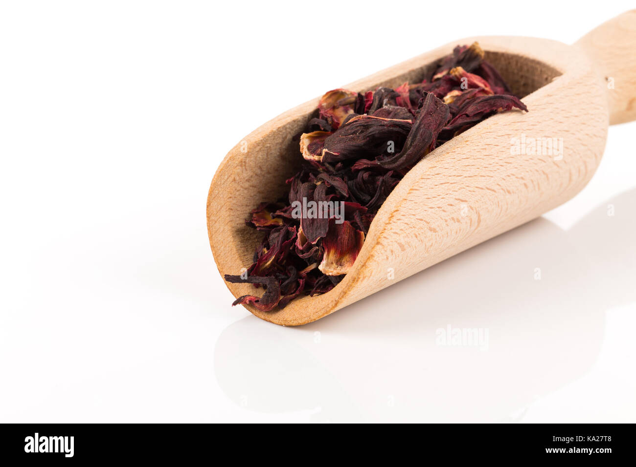 Heap of aromatic Hibiscus tea (karkade) in spoon, isolated on white ...