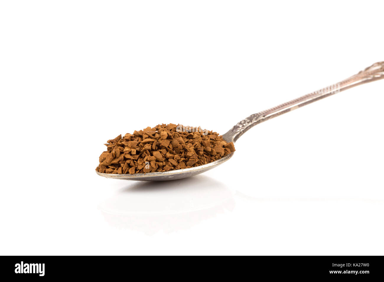Heap of instant coffee in spoon isolated on white background Stock ...