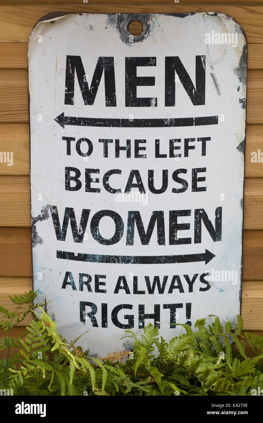 men to the left because women are always right sign Stock Photo - Alamy
