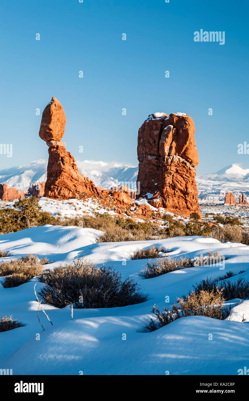 Balanced Rock and snowy landscape, Arches National Park, Moab, Utah USA ...