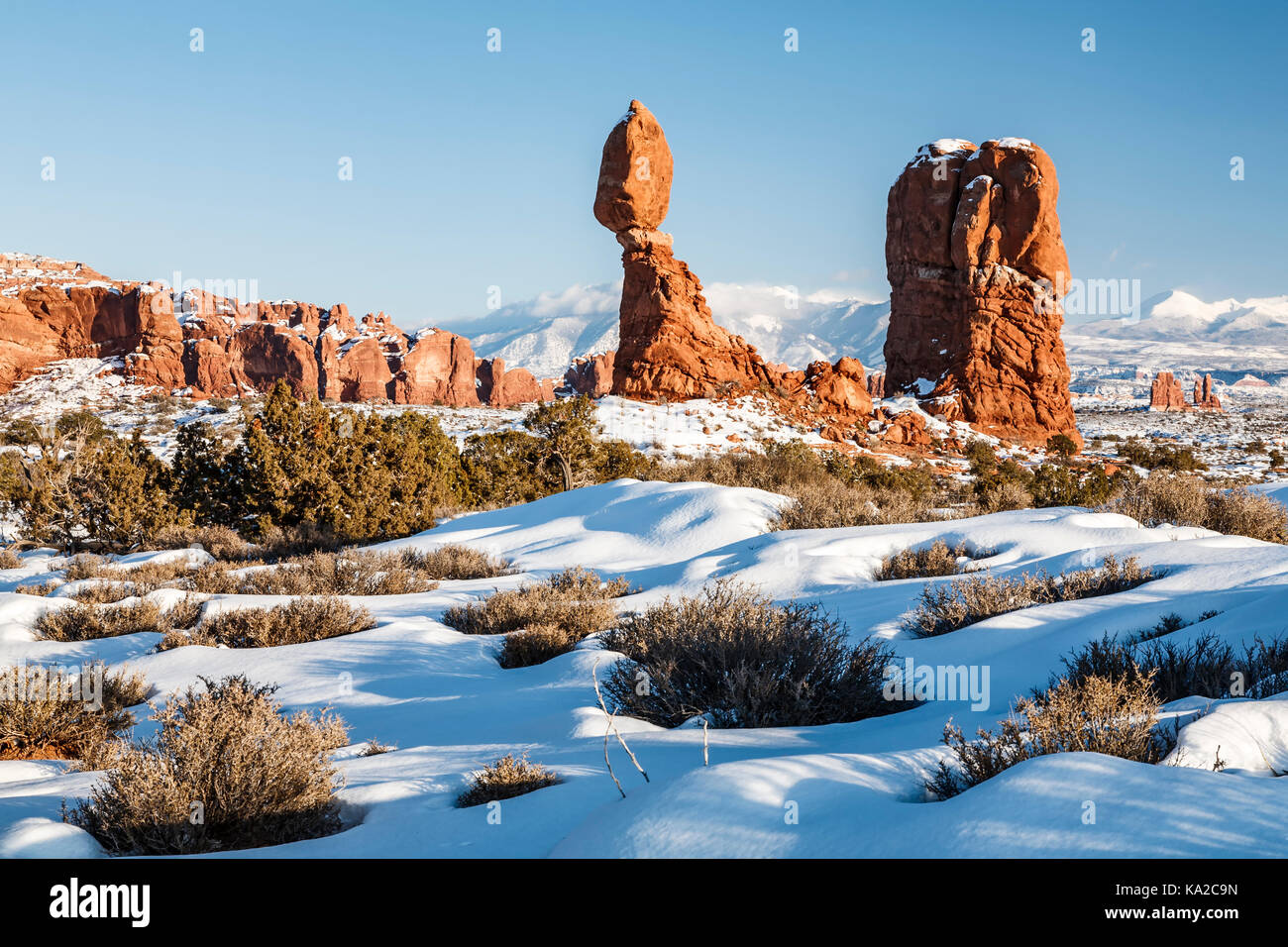 Balanced Rock and snowy landscape, Arches National Park, Moab, Utah USA ...