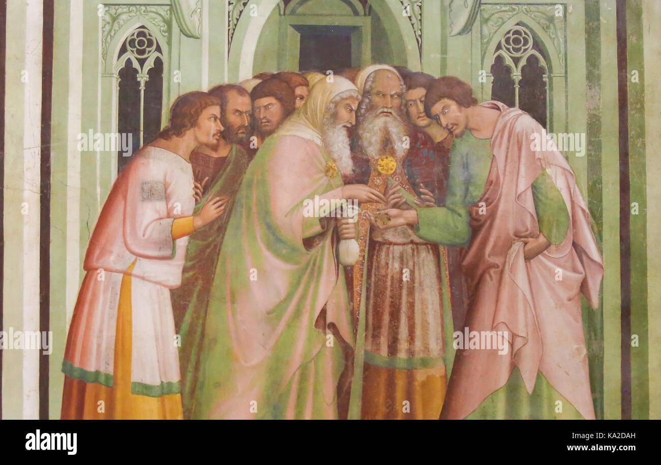 Judas receives thirty pieces of silver to betray Jesus. Fresco in the ...