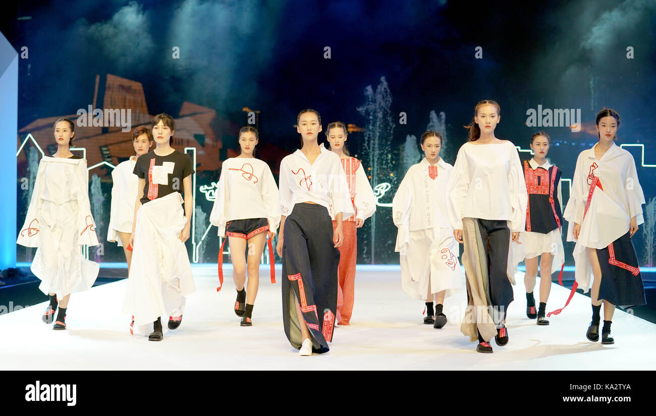Chongqing, China. 24th Sep, 2017. Models present creations at the 2017 ...