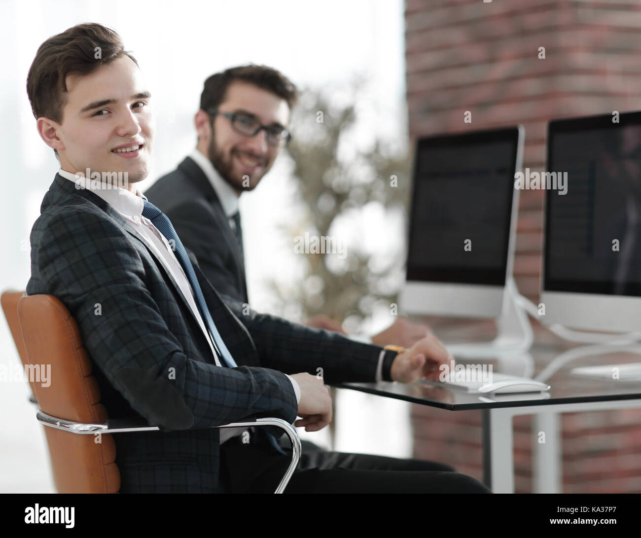 young Manager at his Desk Stock Photo - Alamy