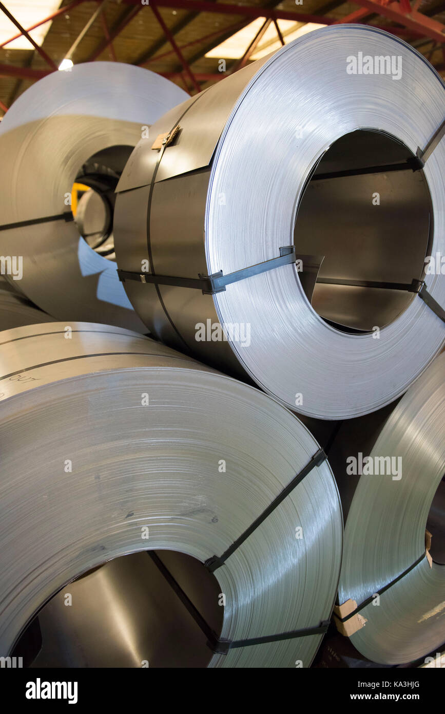 Steel rolls ready for processing in a factory Stock Photo - Alamy