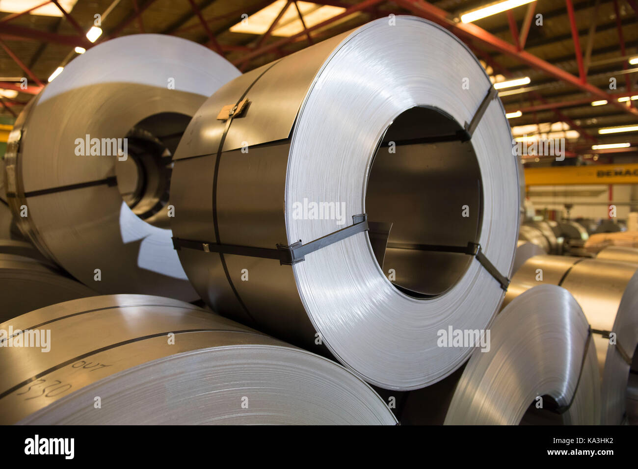 Steel rolls ready for processing in a factory Stock Photo - Alamy