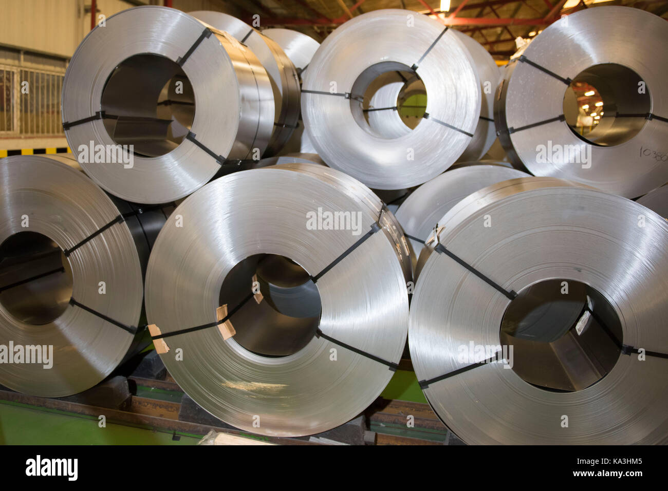 Steel rolls ready for processing in a factory Stock Photo - Alamy