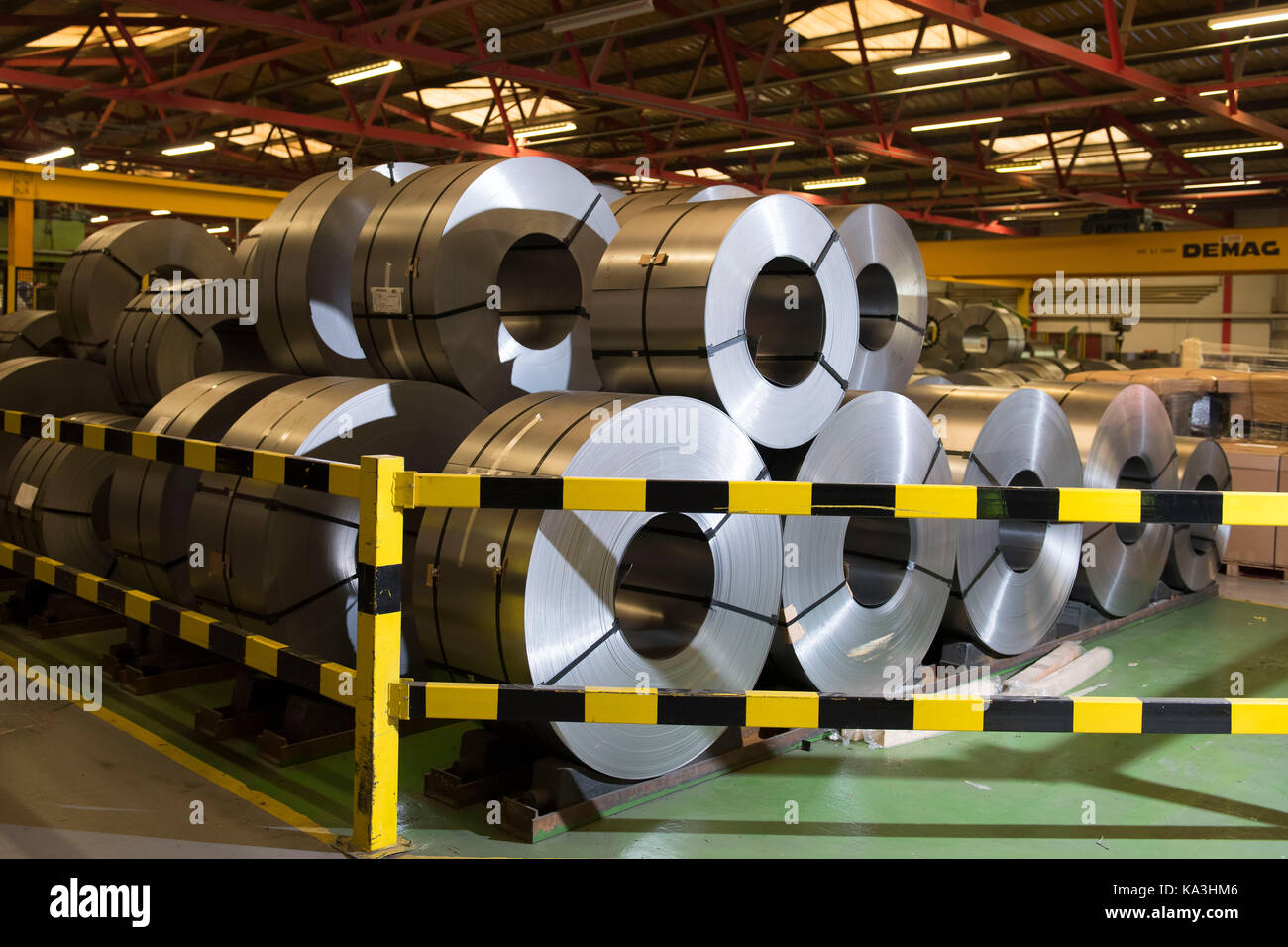 Steel rolls ready for processing in a factory Stock Photo - Alamy