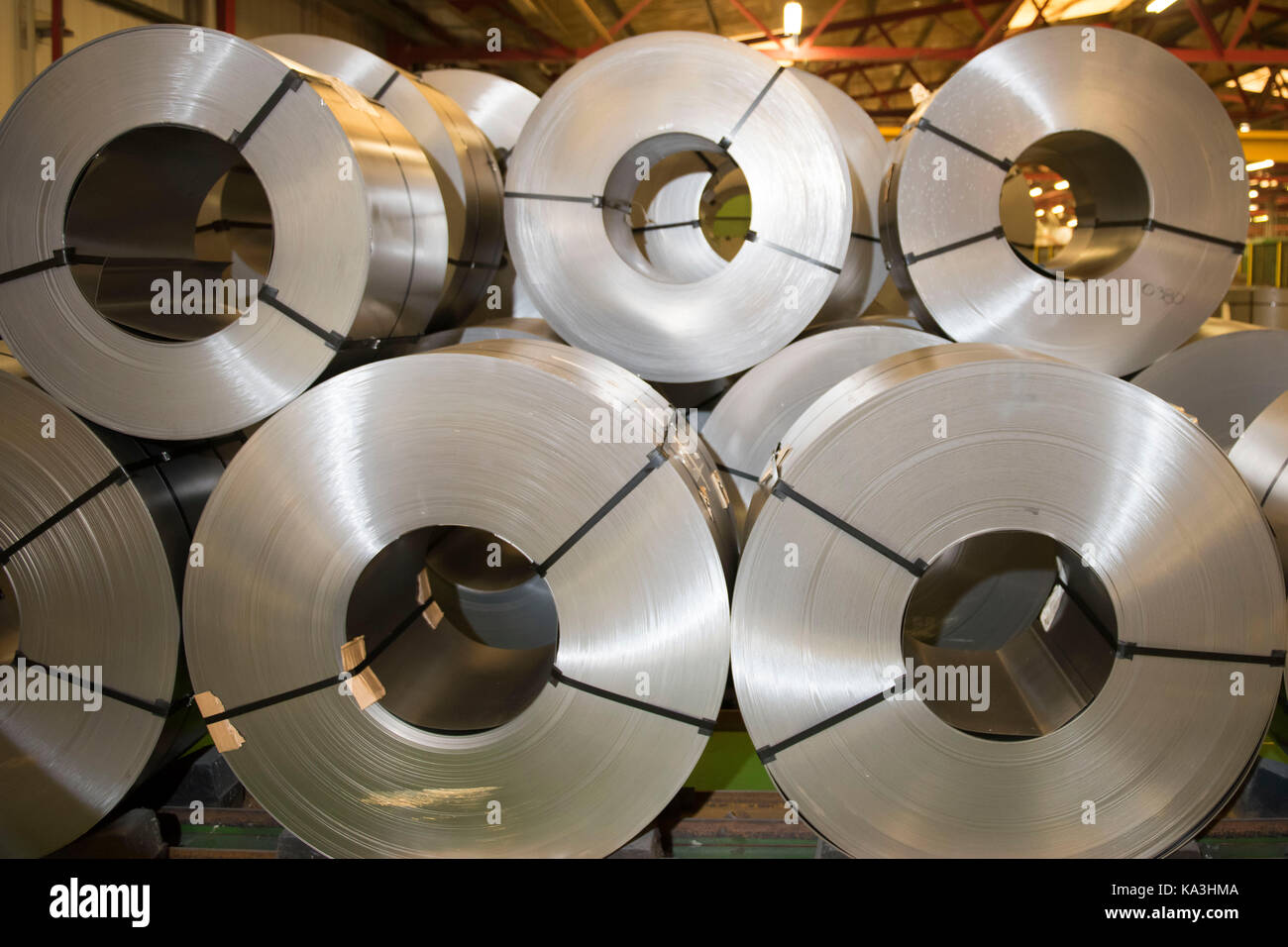 Steel rolls ready for processing in a factory Stock Photo - Alamy