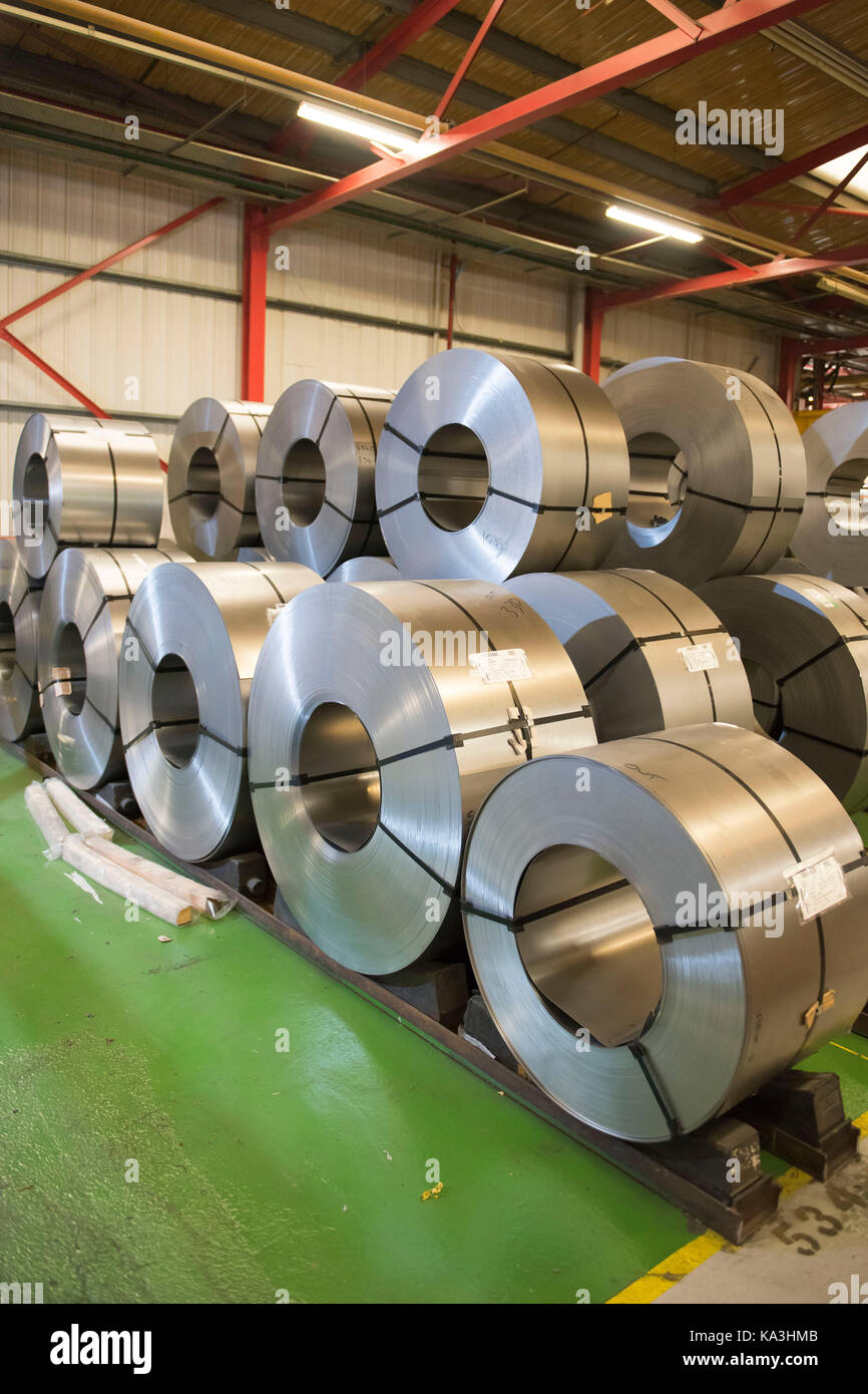 Steel rolls ready for processing in a factory Stock Photo - Alamy