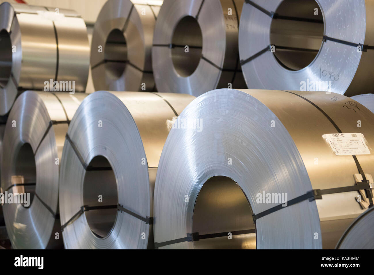 Steel rolls ready for processing in a factory Stock Photo - Alamy