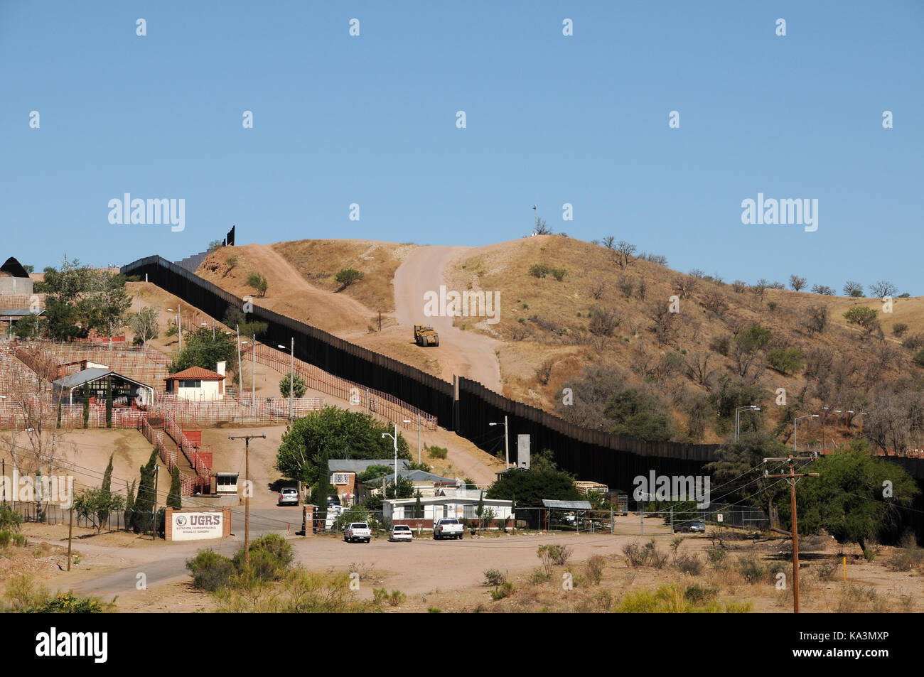 The wall at the Mexican border is modified by U.S. authorities near the ...