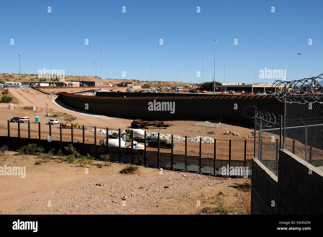 The wall at the Mexican border is modified by U.S. authorities near the ...